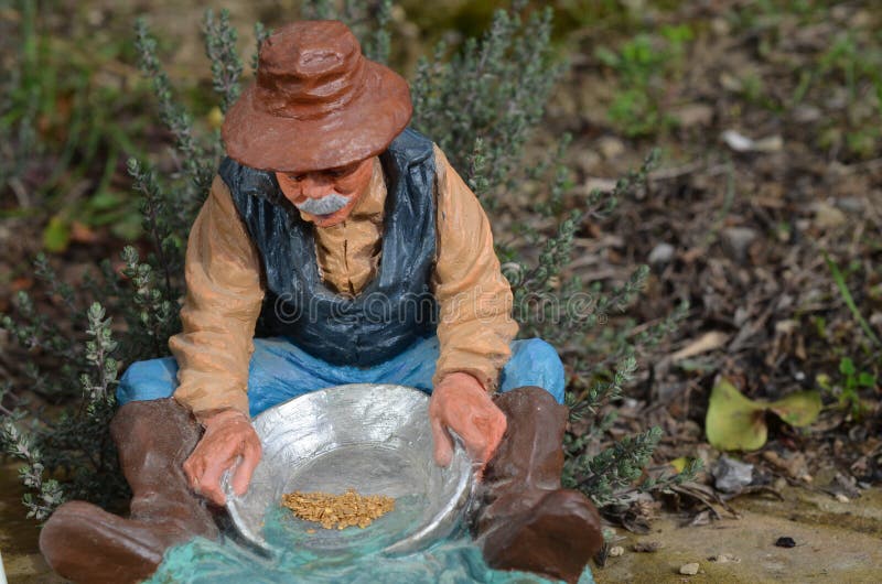 Gold panner stock image. Image of panning, grains, statue - 65963657