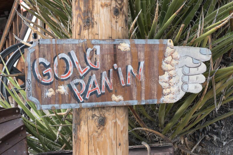 Gold Panning Sign with Finger Pointing Stock Photo - Image of wild ...