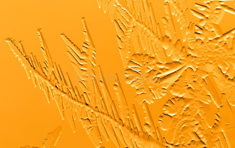 Gold Patterns from Frost on Glass As a Background Stock Image - Image ...