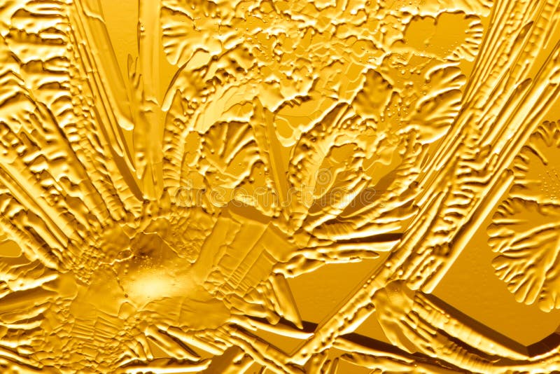 Gold Patterns from Frost on Glass As a Background Stock Image - Image ...