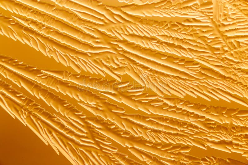 Gold Patterns from Frost on Glass As a Background Stock Image - Image ...