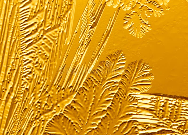 Gold Patterns from Frost on Glass As a Background Stock Photo - Image ...