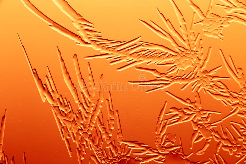 Gold Patterns from Frost on Glass As a Background Stock Image - Image ...