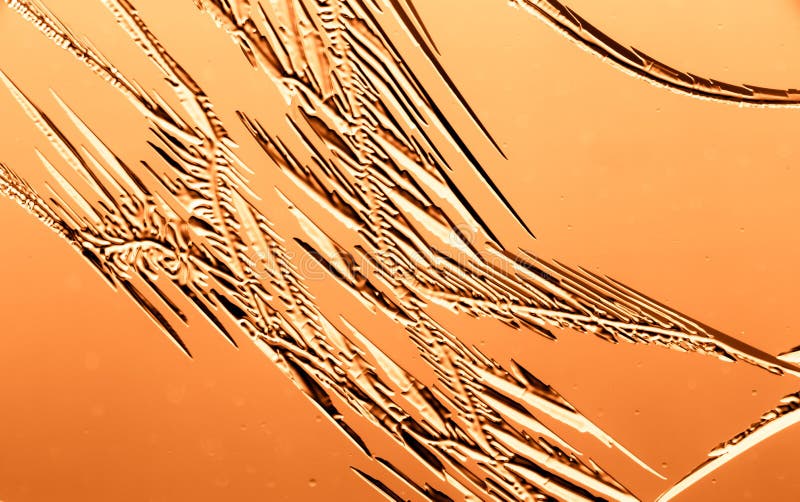 Gold Patterns from Frost on Glass As a Background. Stock Photo - Image ...