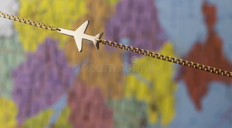 Gold Plane on a Chain on the Background of the Earth Map Stock Image ...