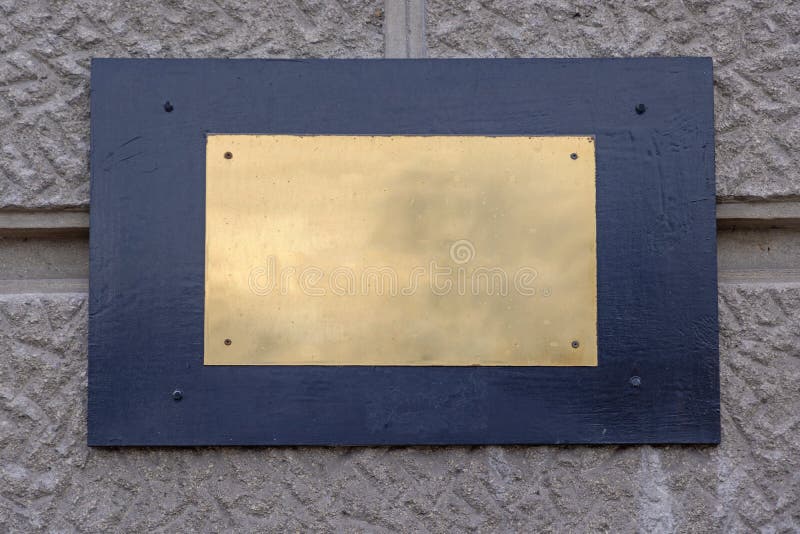 Gold Plaque Wall stock image. Image of structure, sign - 242418853