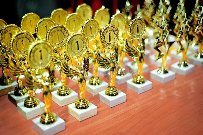 Gold Premium Cups on the Table Stock Image - Image of competition ...