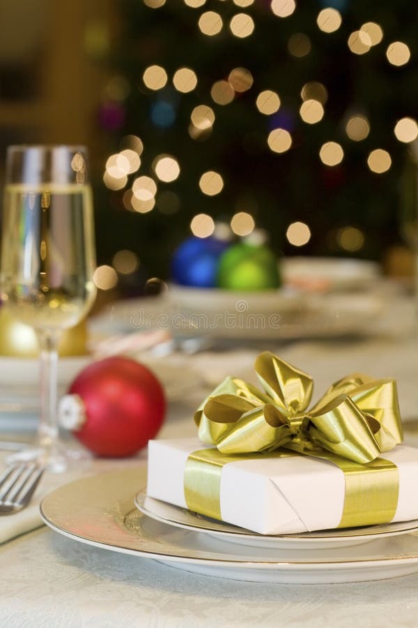 Gold ribbon gift on table stock image. Image of beautiful - 12132243