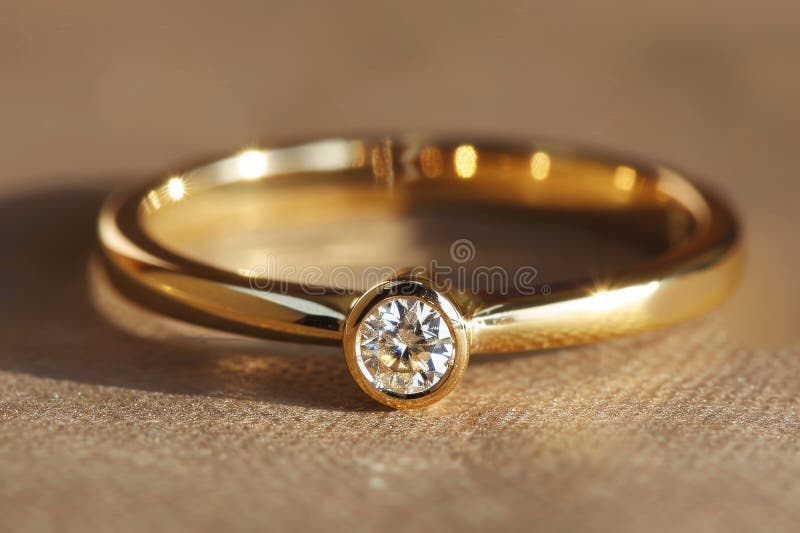 Gold Ring with Diamond on Beige Stock Photo - Image of wealth, romantic ...