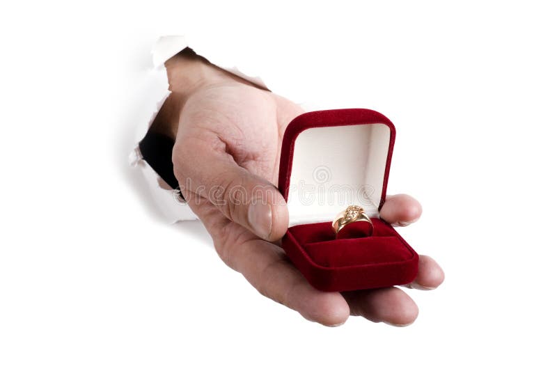 Gold ring on hand stock photo. Image of opening, present - 17340304