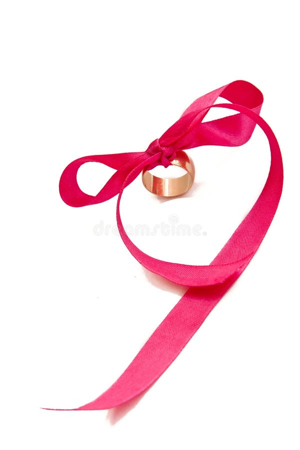 Gold ring and pink ribbon stock photo. Image of jewels - 16307866