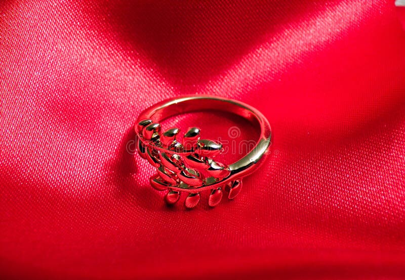 Gold Ring on a Red Silk Cloth. Stock Photo - Image of design, cloth ...
