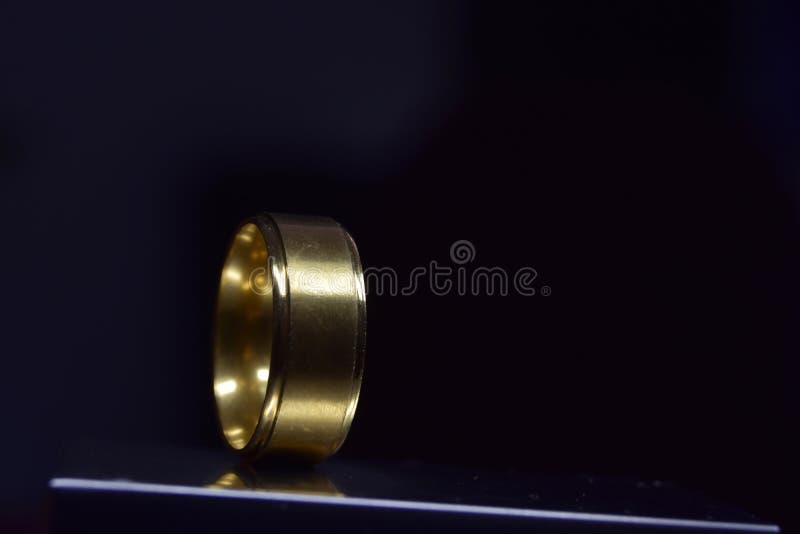 The Gold Ring is a Smooth Ring. that is Luxurious and Beautiful Stock ...
