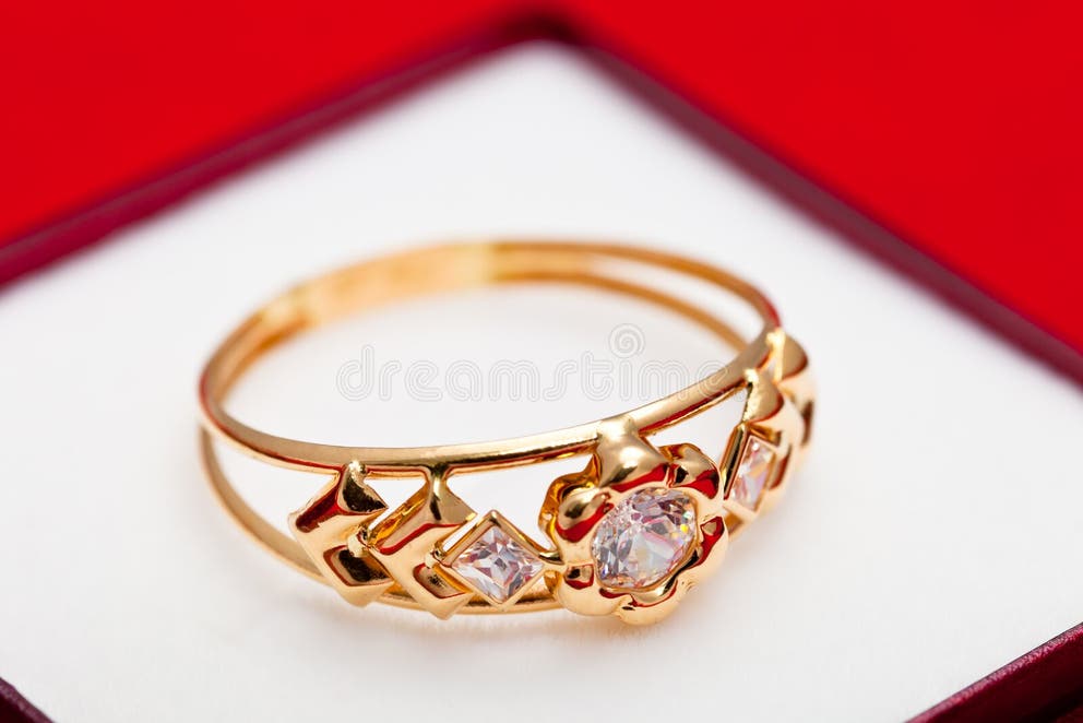 Gold Ring with White Zirconia Enchased Stock Photo - Image of ...