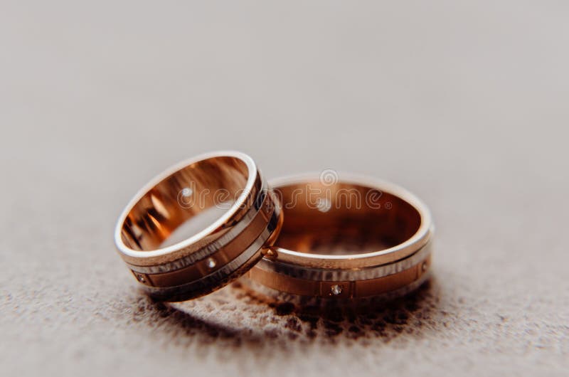 Gold rings close up stock image. Image of wedding, golden - 174640509