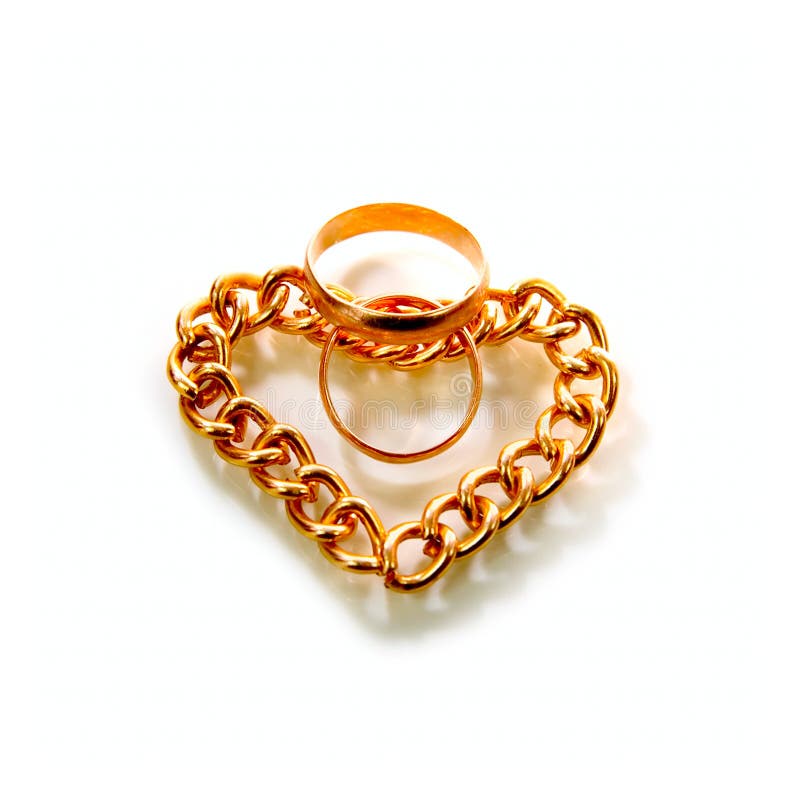 Gold Rings and Heart from Gold Chain Stock Image - Image of element ...