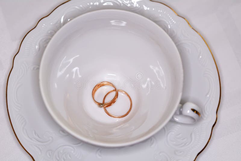 Gold Rings Newlyweds Empty White Cup Stock Photos - Free & Royalty-Free ...