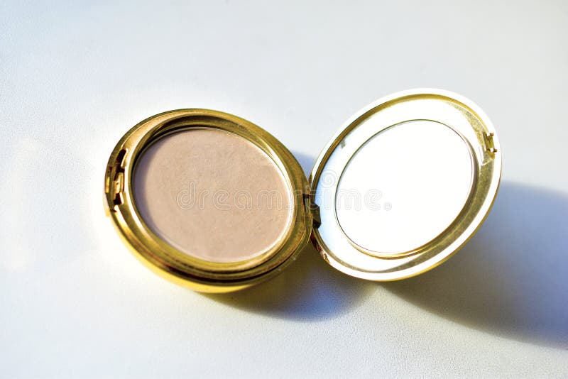 Gold Round Compact with Mirror on White Background Stock Photo - Image ...