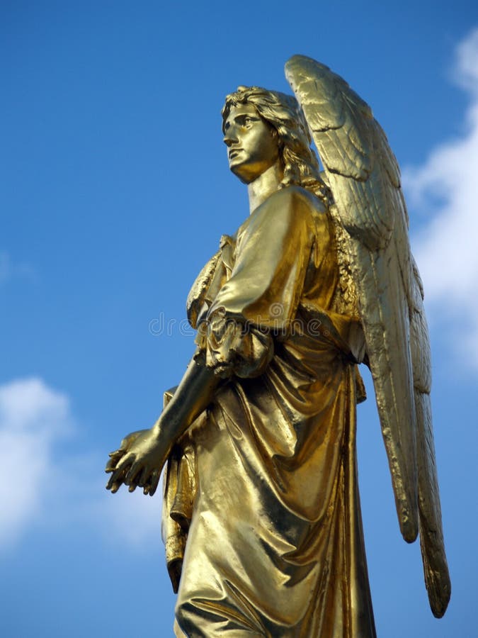 Gold sculpture of an angel editorial stock photo. Image of statue - 957008