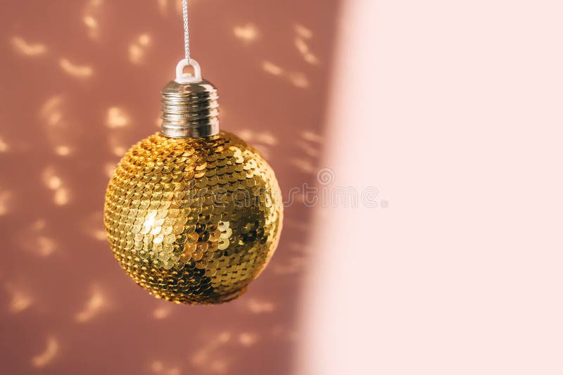 Gold Shiny Balls with Sequins on a Pink Background. Stock Photo - Image ...