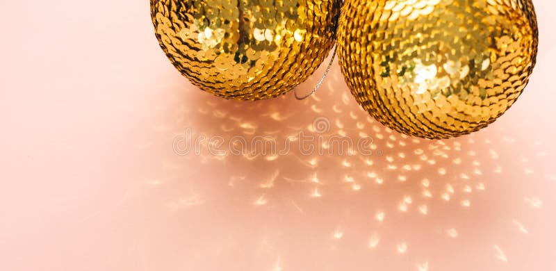 Gold Shiny Balls with Sequins on a Pink Background. Stock Photo - Image ...