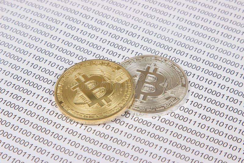 Gold and Silver Bitcoin on the Background of Binary Code Stock Photo ...