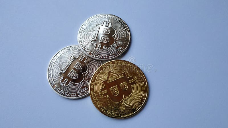 Gold and Silver Bitcoin Macro Focus on White Background Stock Image ...