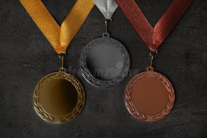 Gold, Silver and Bronze Medals on Stone Background, Flat Lay. Space for ...