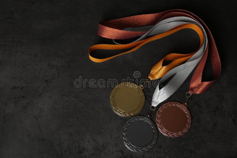 Gold, Silver and Bronze Medals on Stone Background, Flat Lay. Space for ...