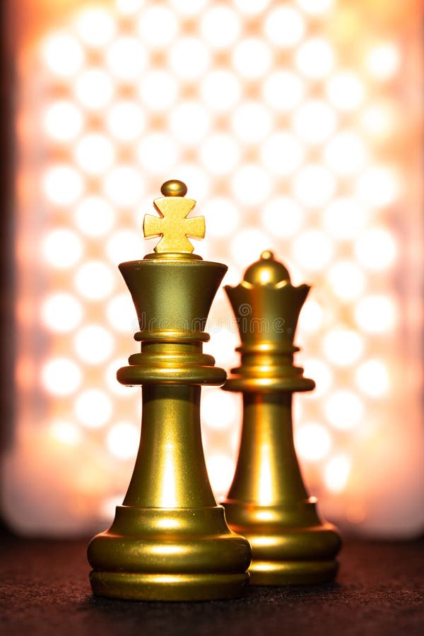Gold and Silver Chess Pieces on a Background of Light Stock Image ... Gold and Silver Chess Pieces on a Background of Light Stock Image ...