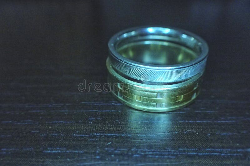 Gold and Silver Wedding Rings on a Table - Closeup Stock Image - Image ...
