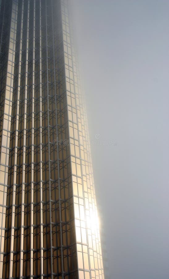 Gold Skyscraper in the fog stock photo. Image of gray - 20011804