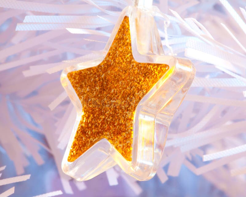 Gold star lighting stock photo. Image of lightbulb, radiance - 84832076