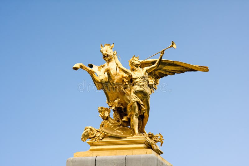 A Gold Statue Of An Angel And Horse In Paris. Stock Image - Image of ...