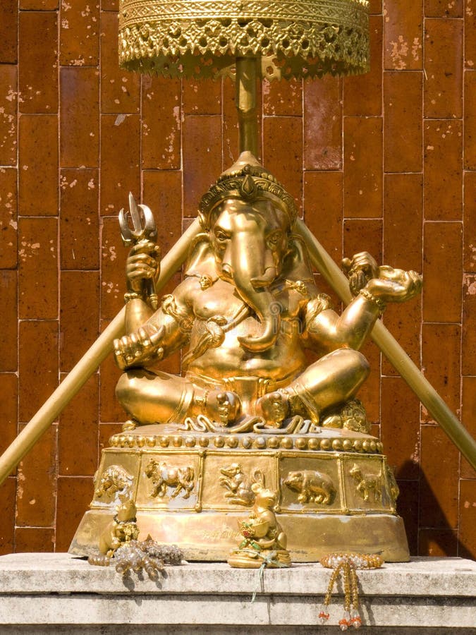 Gold statue of Ganesha stock photo. Image of belief, meditation - 90428432