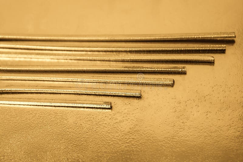 Gold Sticks on a Gold Background. Stock Image - Image of fineness ...