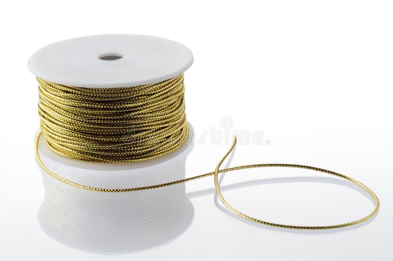 Gold string spool stock image. Image of fashion, home - 4883859