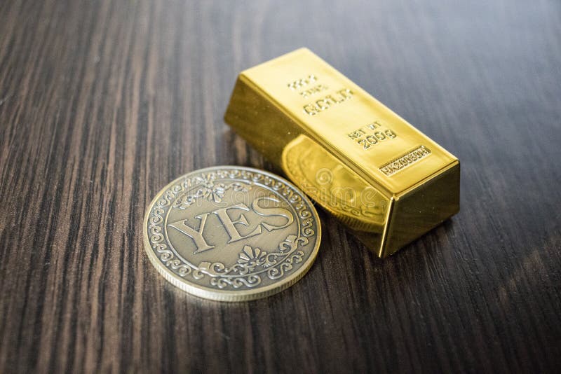 Gold on the Table with a Coin Yes Stock Image - Image of prediction ...