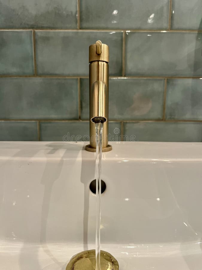 Gold Tap stock image. Image of sink, tiles, gold, flow - 295276341