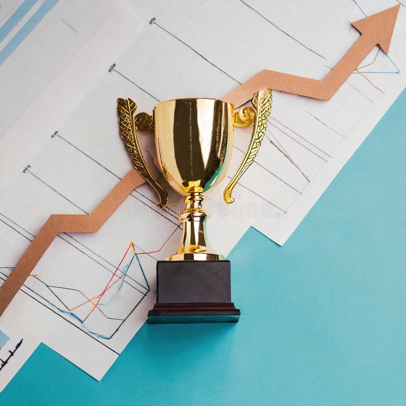 Gold Trophy on Top of Financial Graphs with an Arrow Pointing Up Stock ...