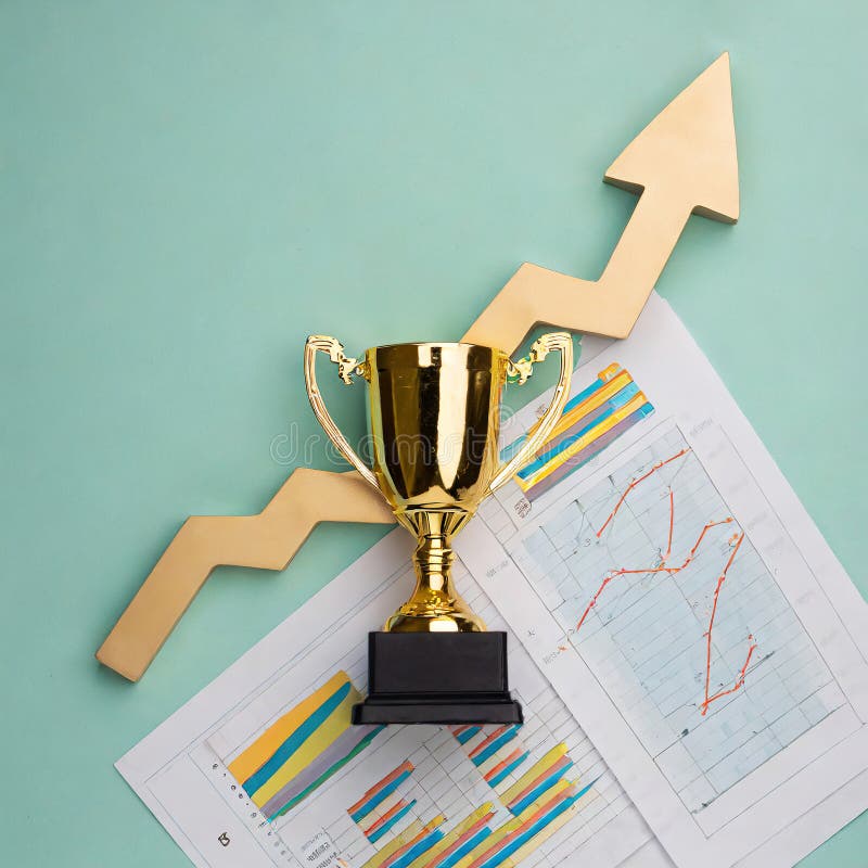 Gold Trophy on Top of Financial Graphs with an Arrow Pointing Up Stock ...