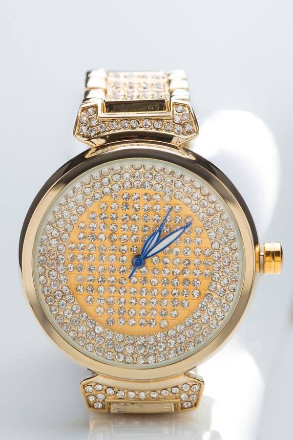 Gold watch with diamonds stock image. Image of clockworks - 51334985