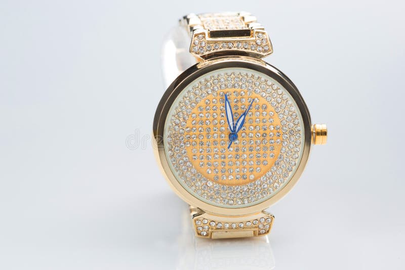 Gold watch with diamonds stock image. Image of clockworks - 51334985