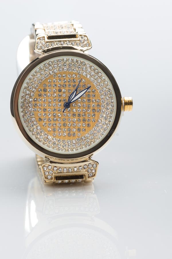 Gold watch with diamonds stock image. Image of clockworks - 51334985