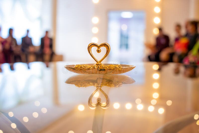 Gold Wedding Ring Stand with Heart Stock Image - Image of glass, gold ...