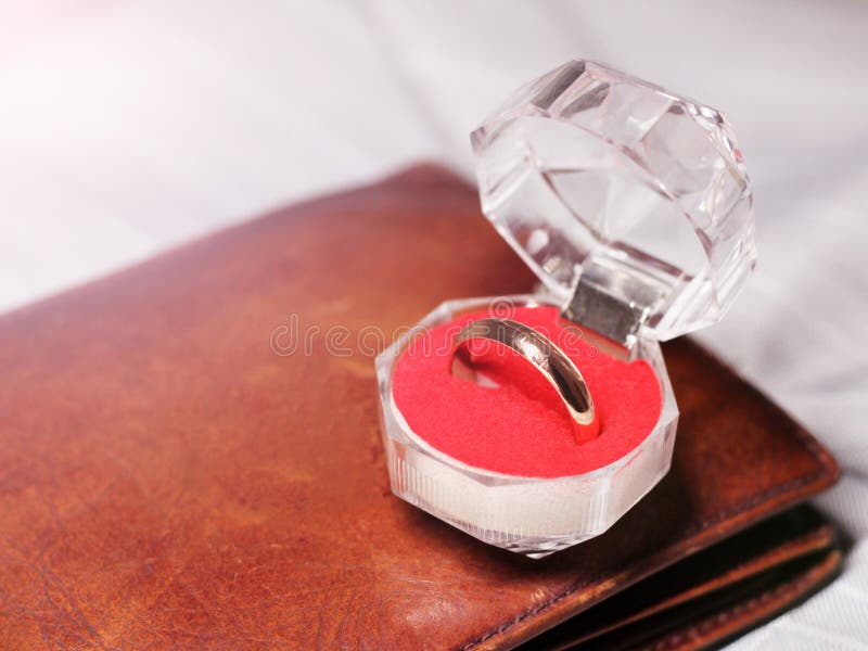 Gold Wedding Ring in a Transparent Glass Box Stock Photo - Image of ...