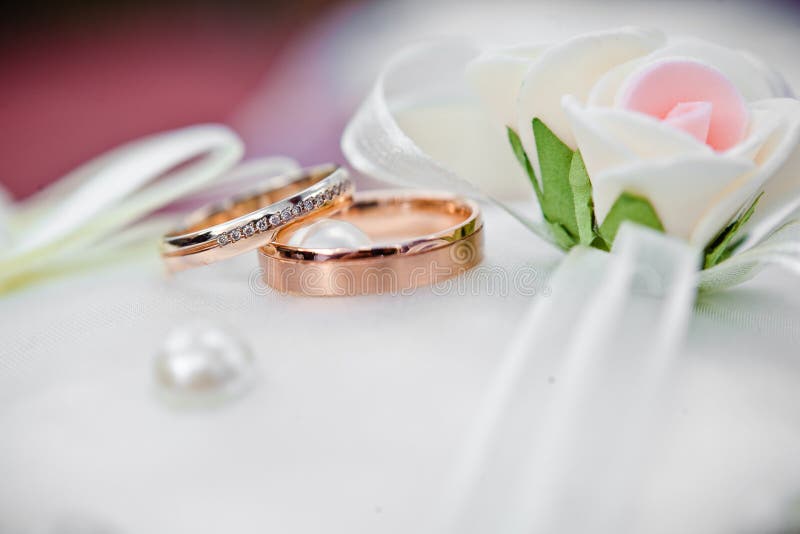 Gold wedding rings stock image. Image of hands, lacy - 27827163