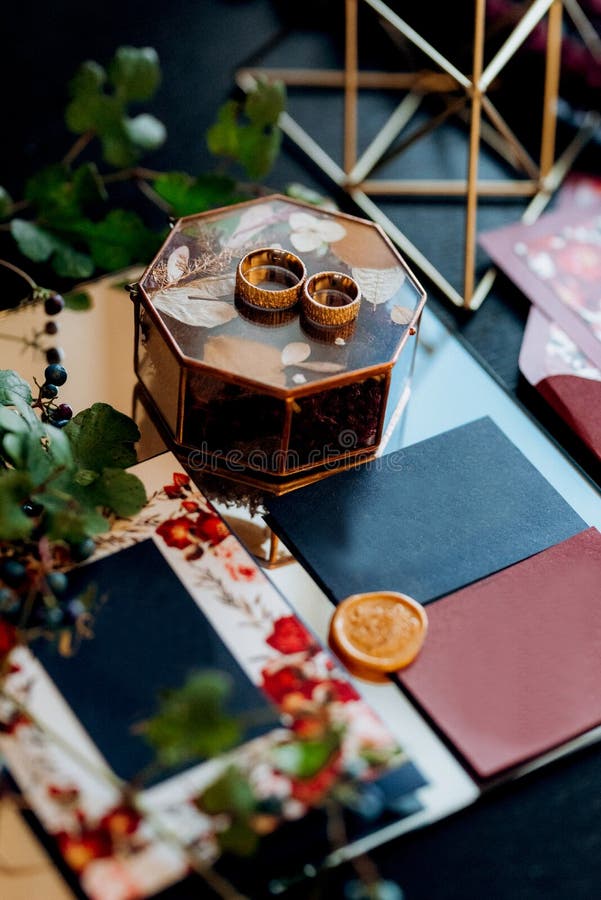 Gold Wedding Rings with a Wedding Decor Stock Photo - Image of romantic ...