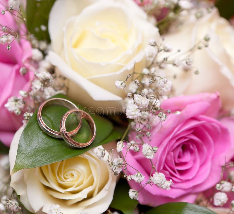 Gold Wedding Rings on Flower . Decorating Stock Image - Image of ...