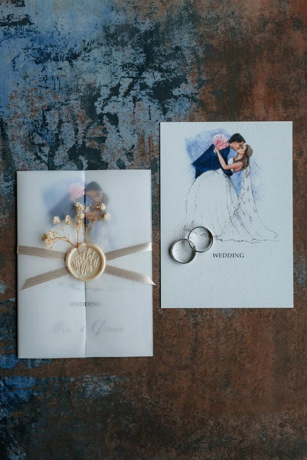 Gold Wedding Rings with a Invitation Wedding Stock Image - Image of ...